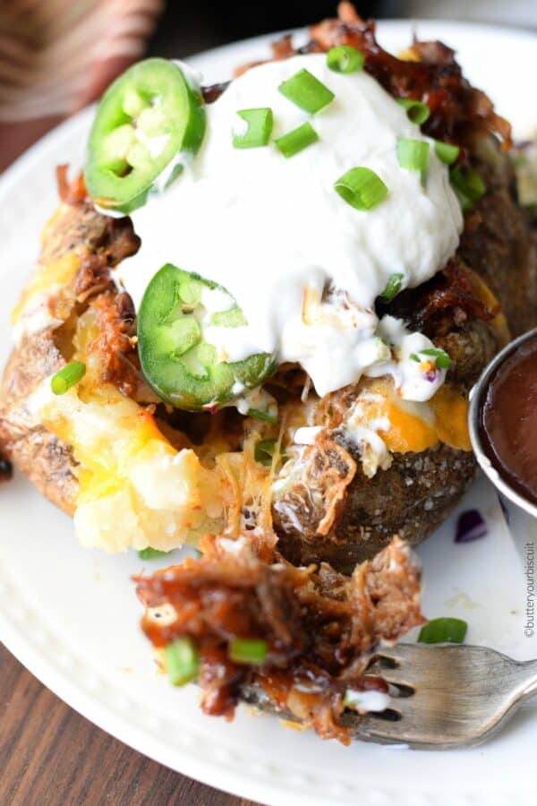 Pulled Pork Loaded Baked Potatoes Recipe-Butter Your Biscuit