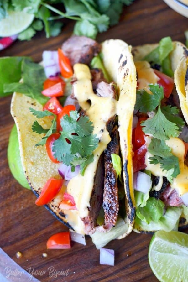 Grilled Steak Tacos with Nacho Cheese Sauce | Butter Your Biscuit